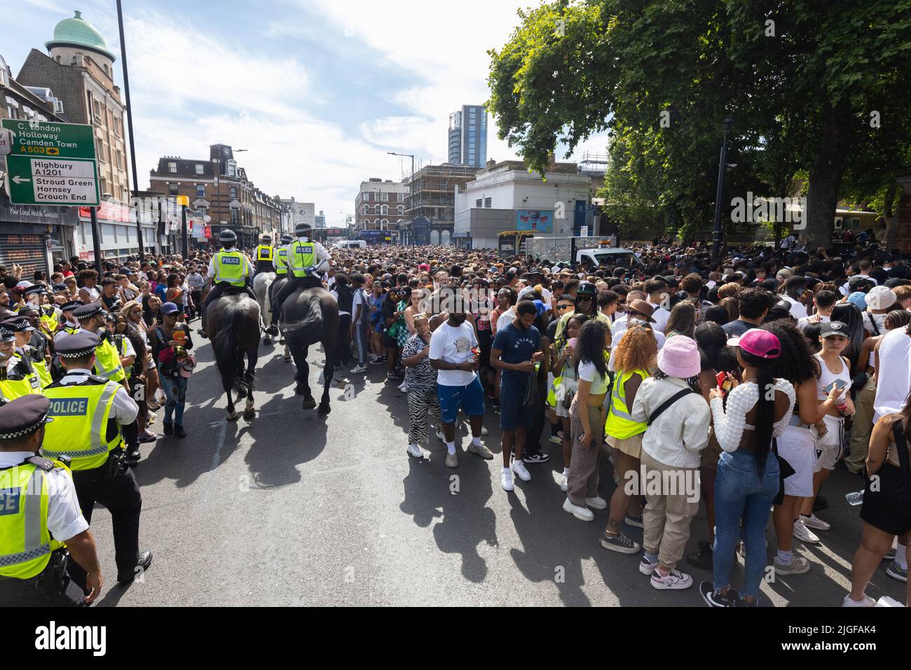 Crowds wait outside as big queues form at the entrance to Wireless ...