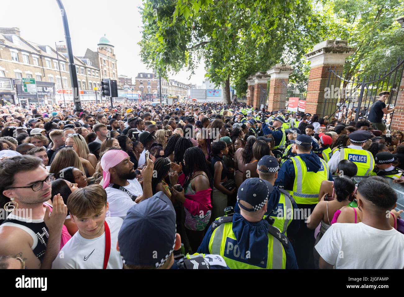 Crowds wait outside as big queues form at the entrance to Wireless ...