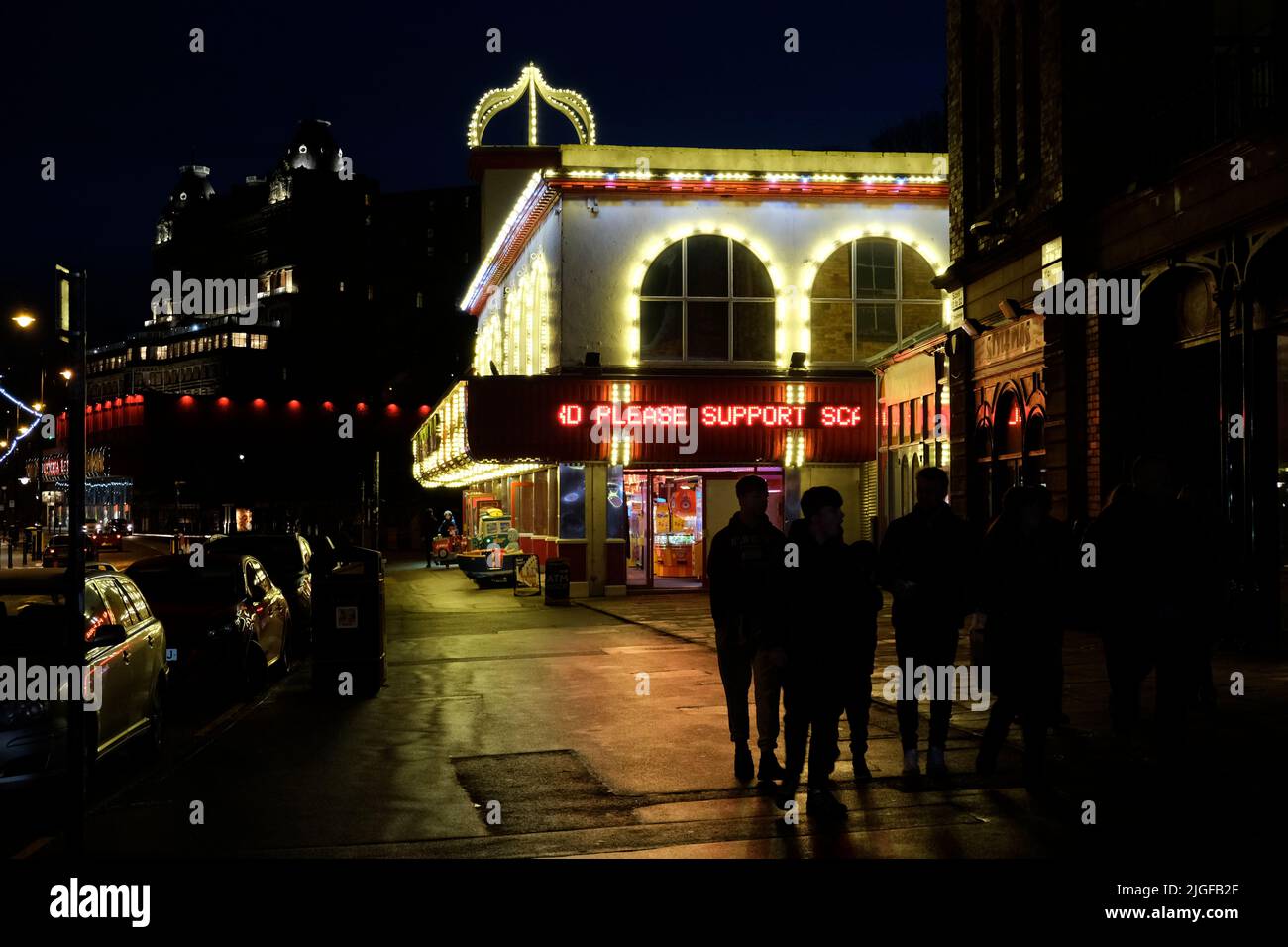 People on Scarborough seafront at night Stock Photo - Alamy