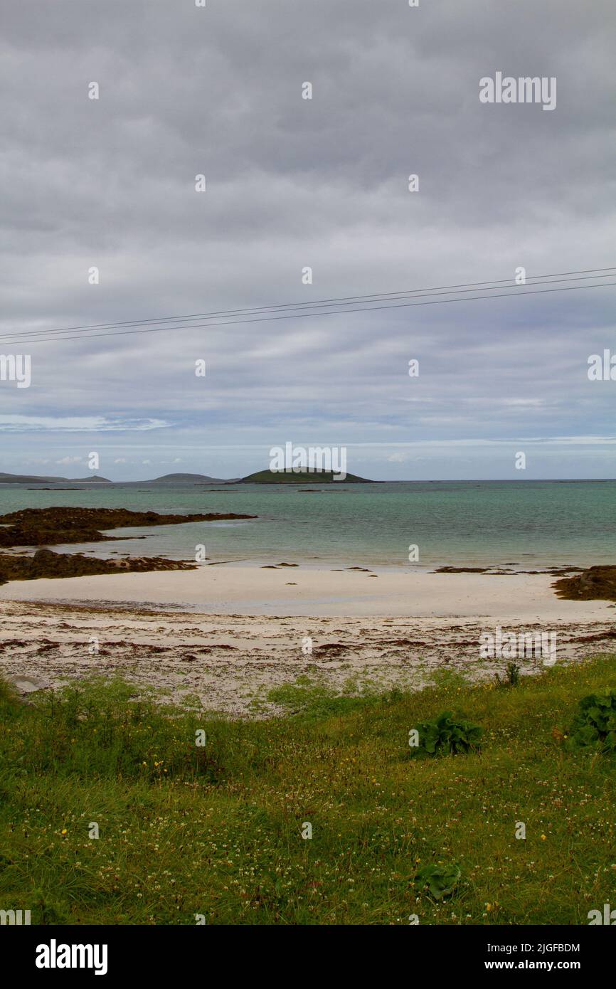 Beach near the causeway joining Eriskay to South Uist, Outer Hebrides ...