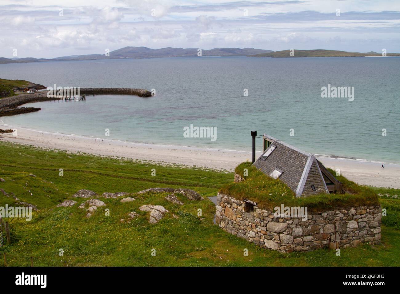 Breakwater, Eriskay Ferry Terminal at Ceann a' Ghàraidh with Barra in ...