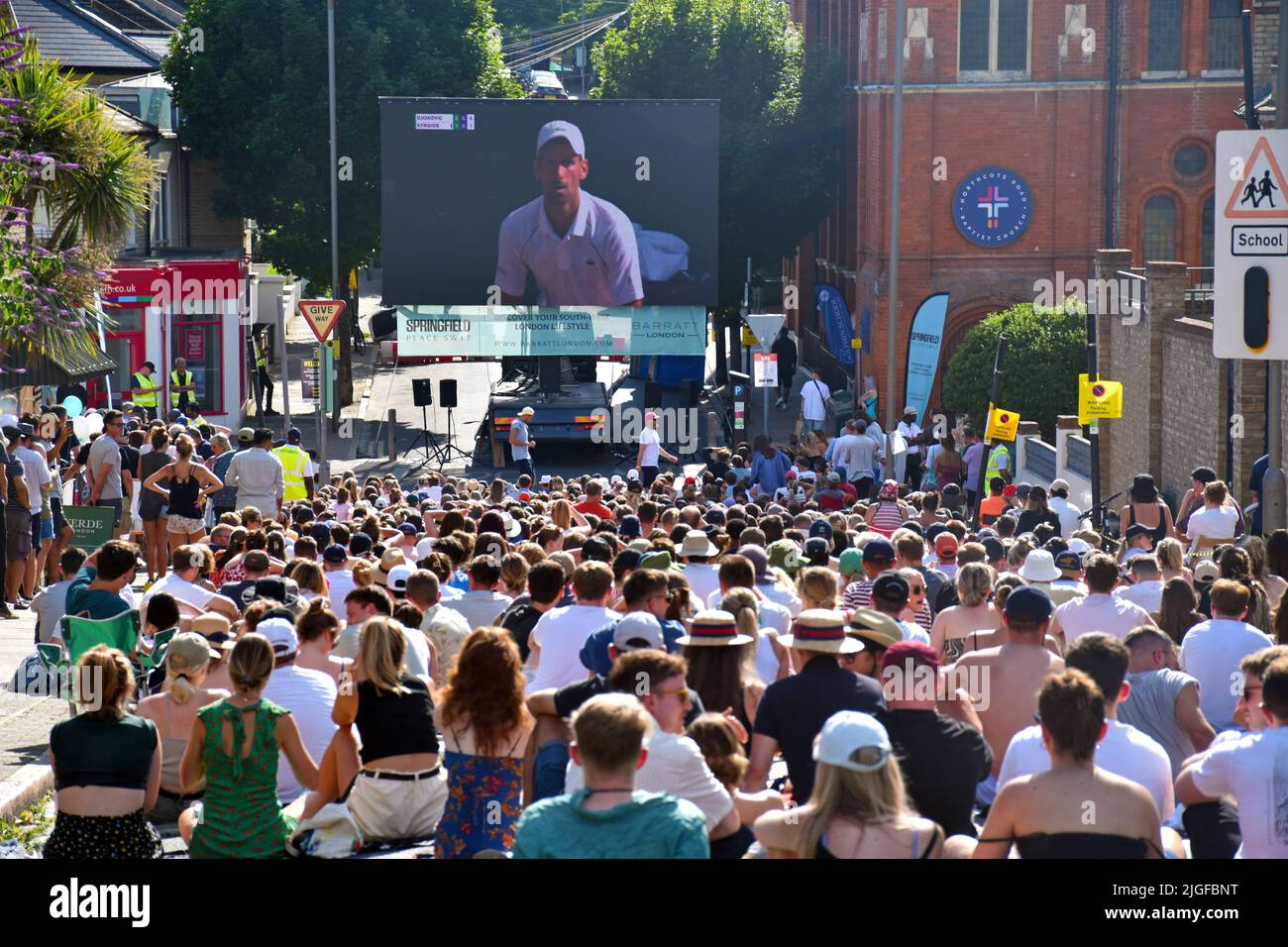 London, UK. 10th July, 2022. Large crowds watch giant screen for ...
