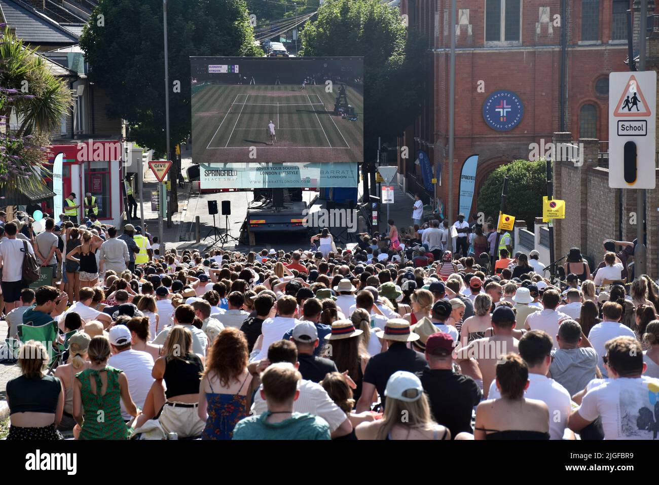 London, UK. 10th July, 2022. Large crowds watch giant screen for ...