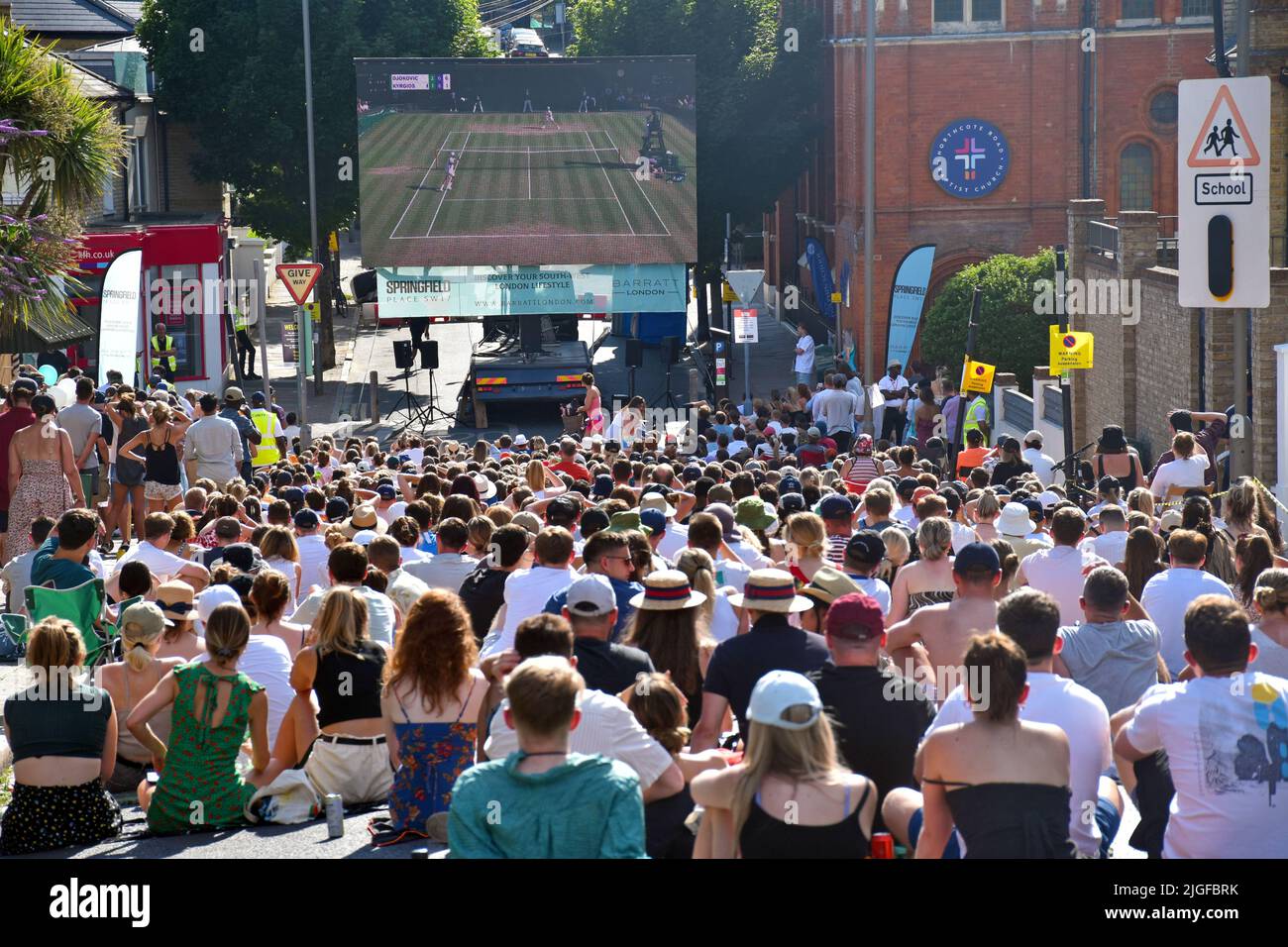 London, UK. 10th July, 2022. Large crowds watch giant screen for ...