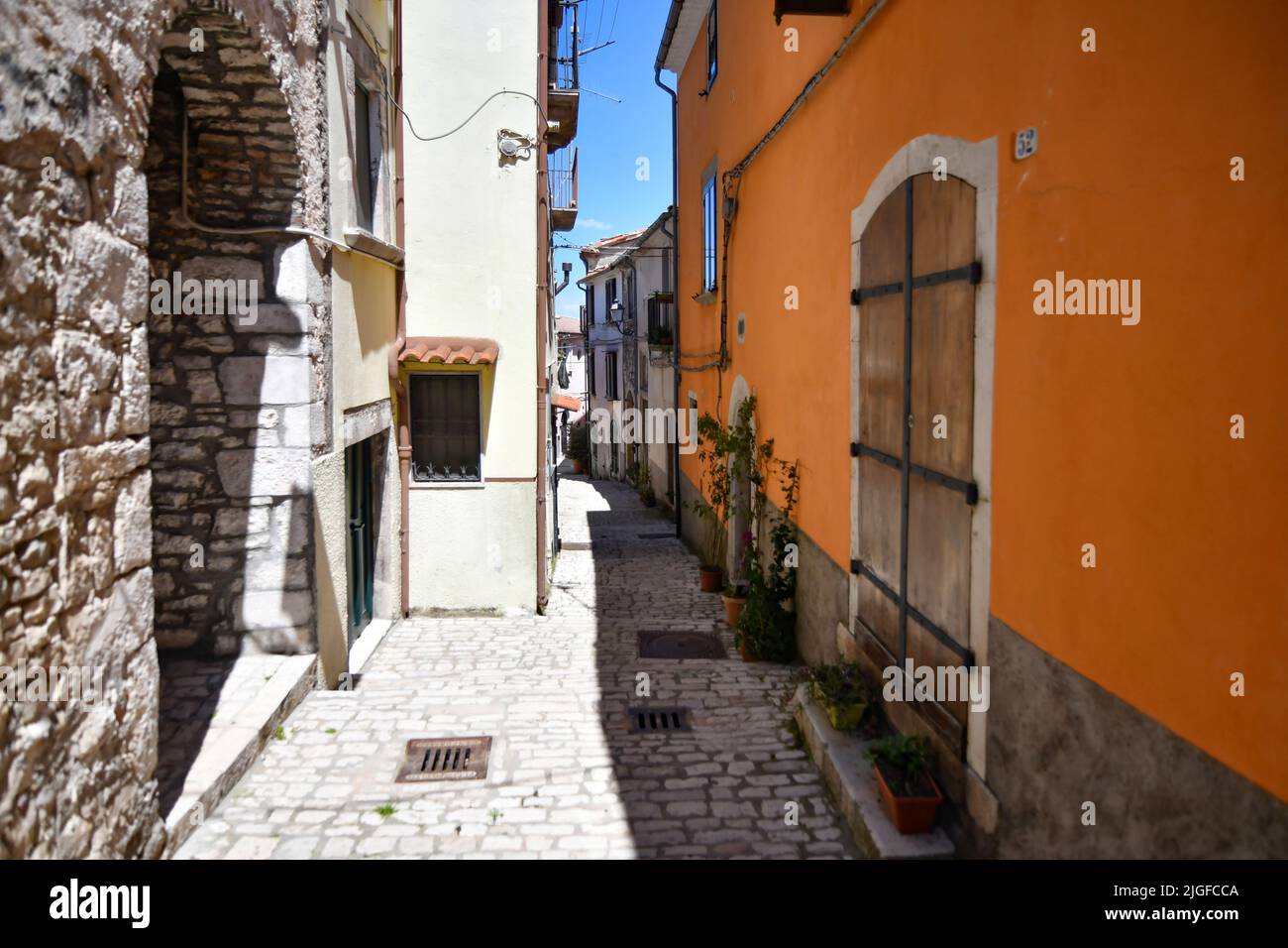 A narrow street in the medieval village of Sepino in the Molise region ...