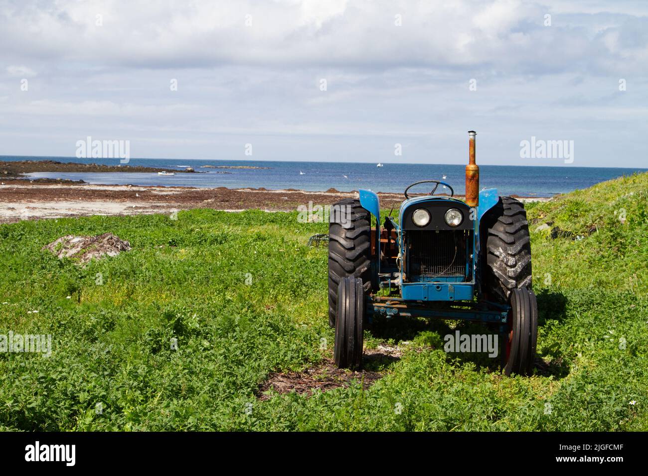 Farm vehicles on Boisdale Beach, South Uist, Outer Hebrides Stock Photo ...
