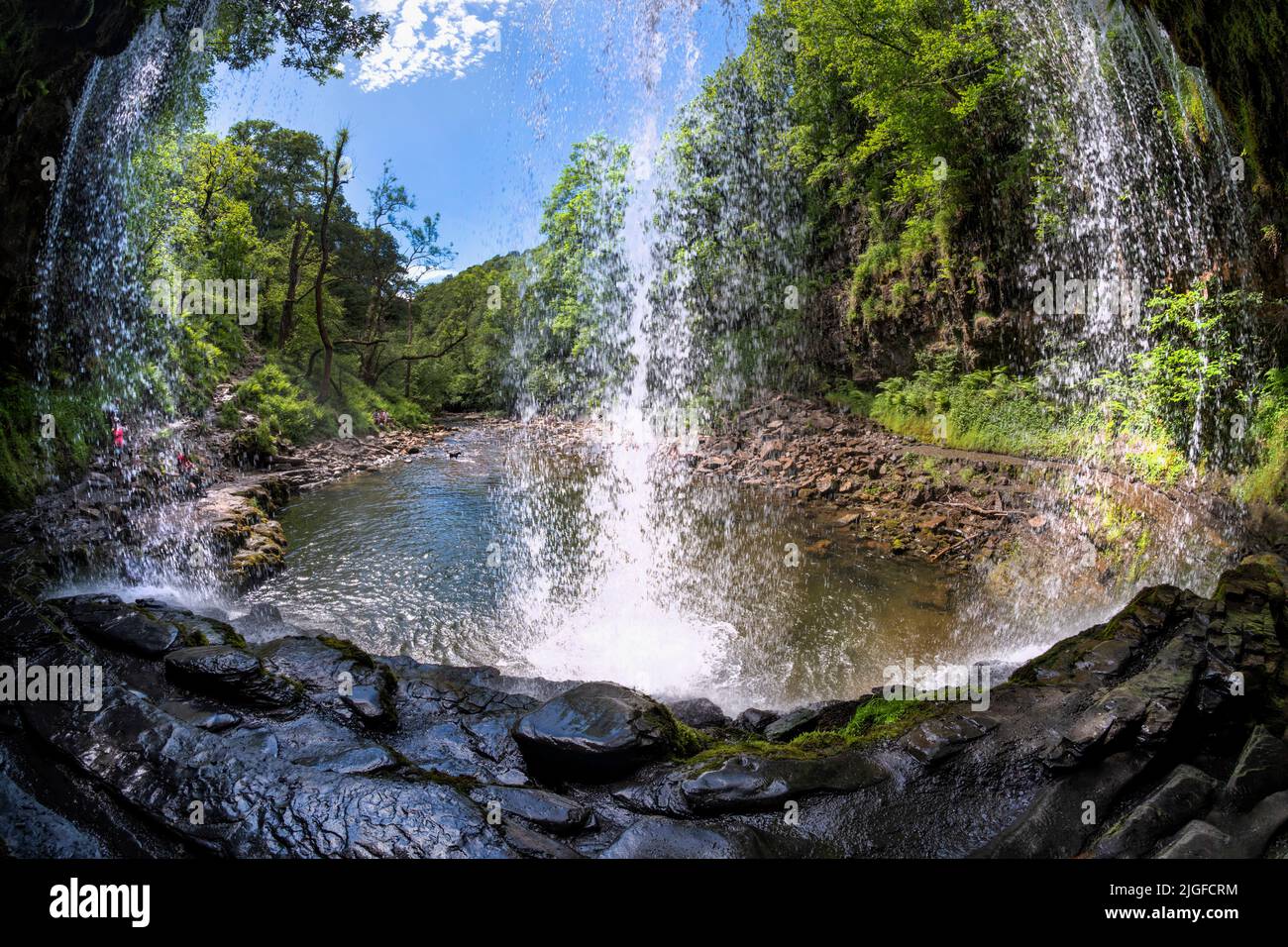 A view from behind behind Sgwd Yr Eira. a spectacular waterfall on the ...