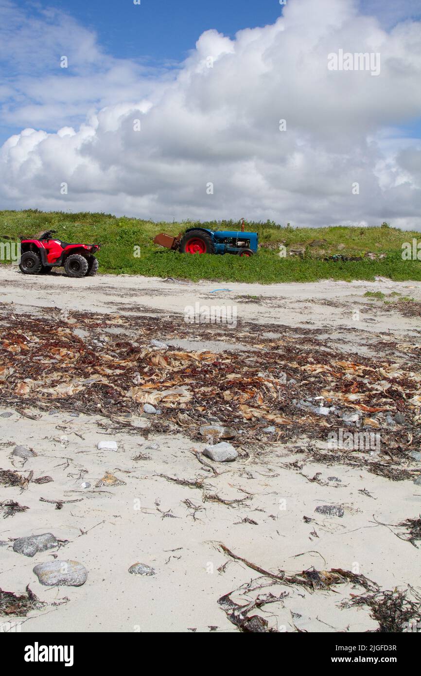 Farm vehicles on Boisdale Beach, South Uist, Outer Hebrides Stock Photo ...