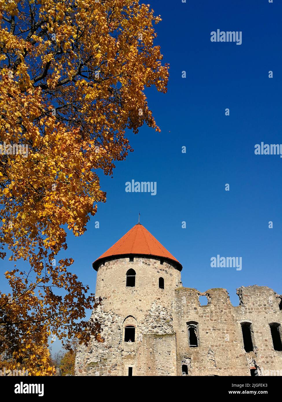 Historical building made of bricks on a sunny day. Medieval castle ...