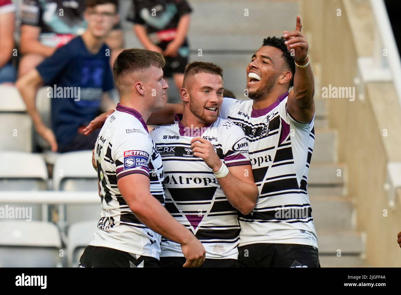 Darnell McIntosh #5 of Hull FC celebrates with try scorer Connor Wynne ...