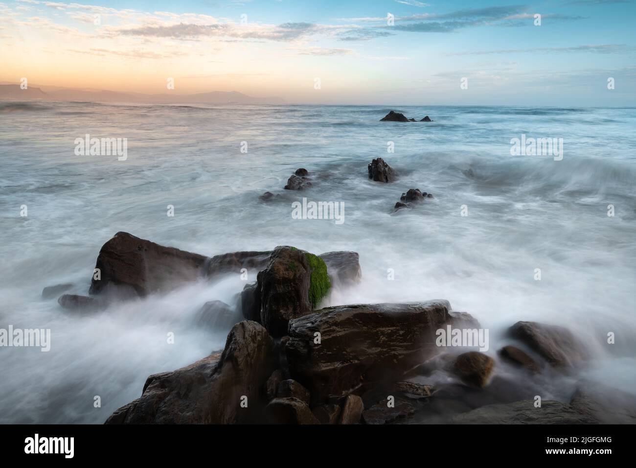 Beach of Barrika at high tide, Basque Country, Spain Stock Photo - Alamy