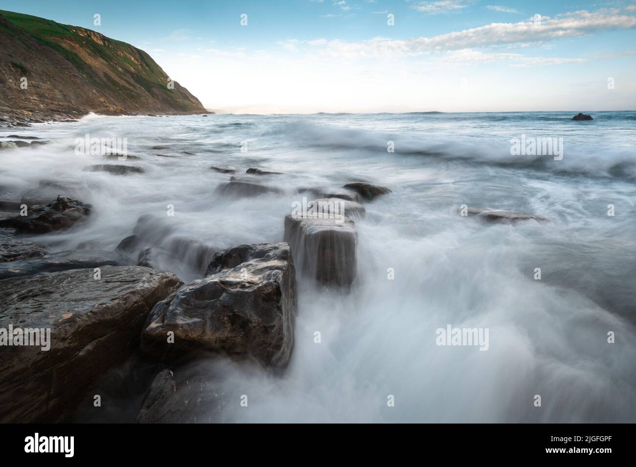 Beach of Barrika at high tide, Basque Country, Spain Stock Photo - Alamy