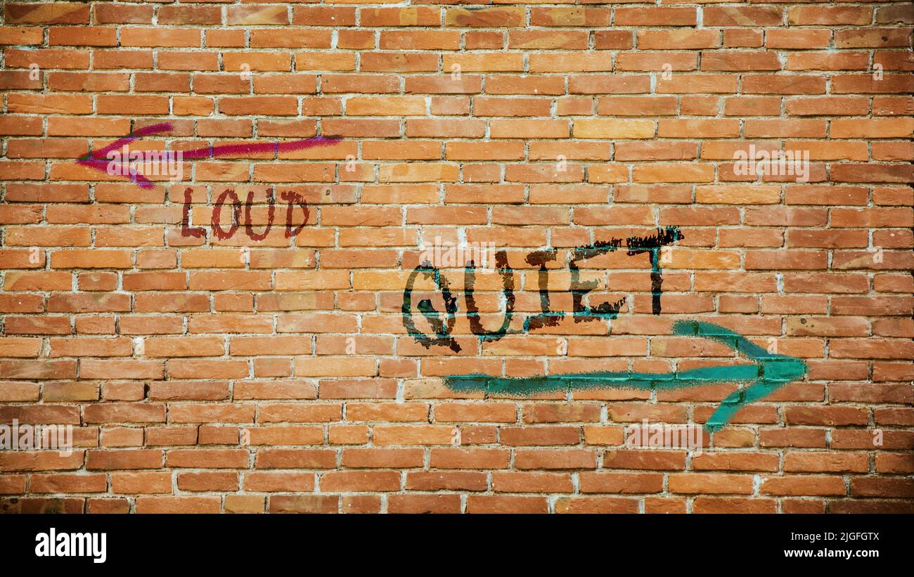 Street Sign the Direction Way to Quiet versus Loud Stock Photo - Alamy