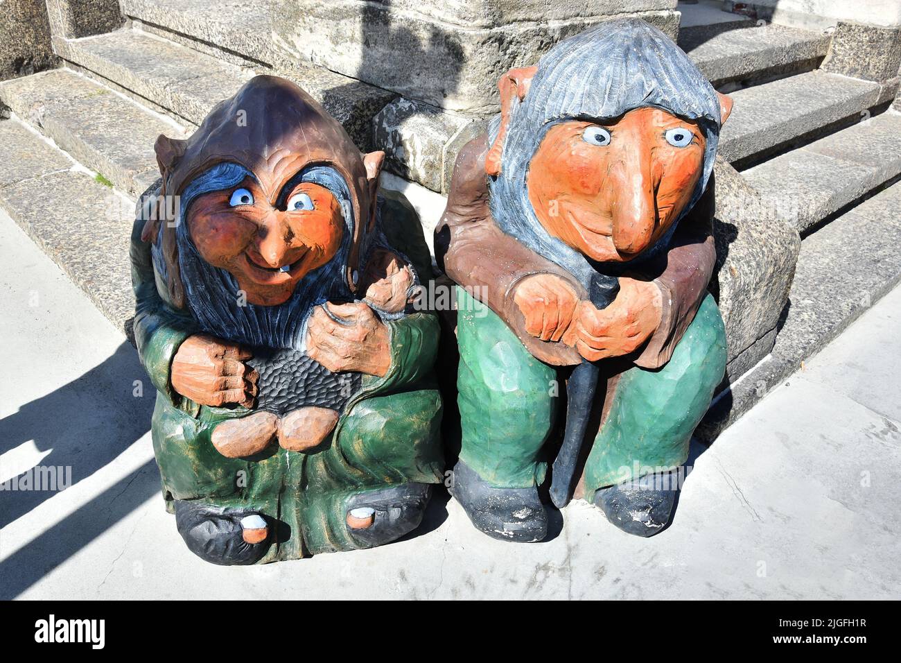 Couple of trolls in the street in Alesund, Norway, traditional mystical ...
