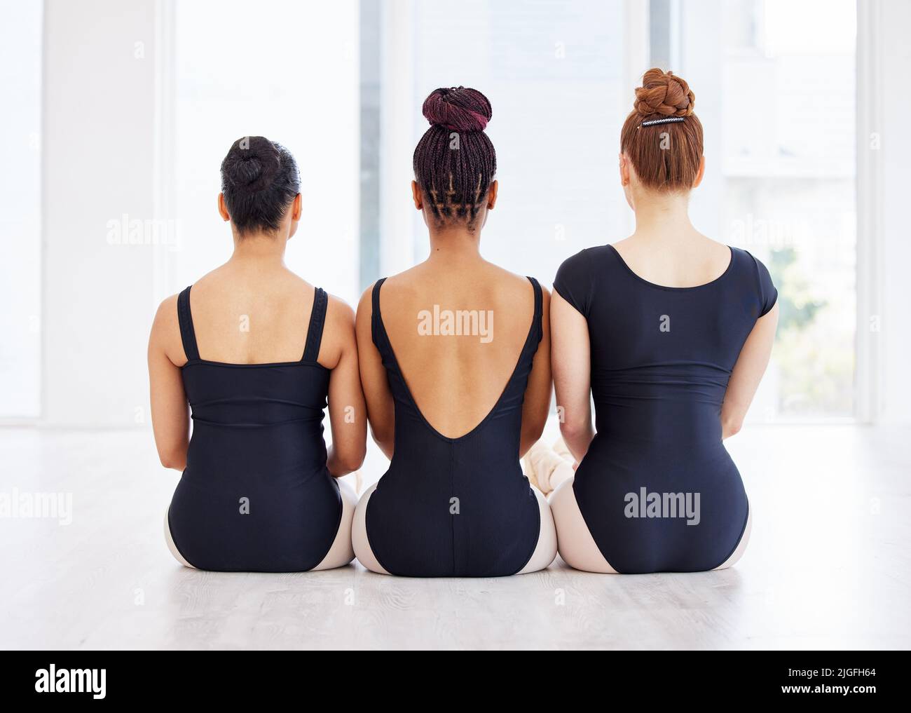 Centering ourselves before the show. a group of ballerinas in a row ...