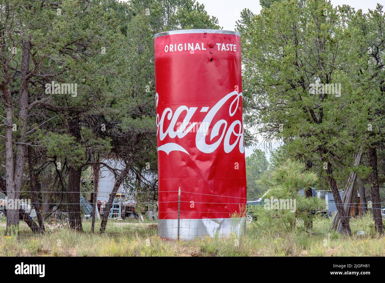 A large Coca Cola advertising sign on the side of the road Pecos in New ...