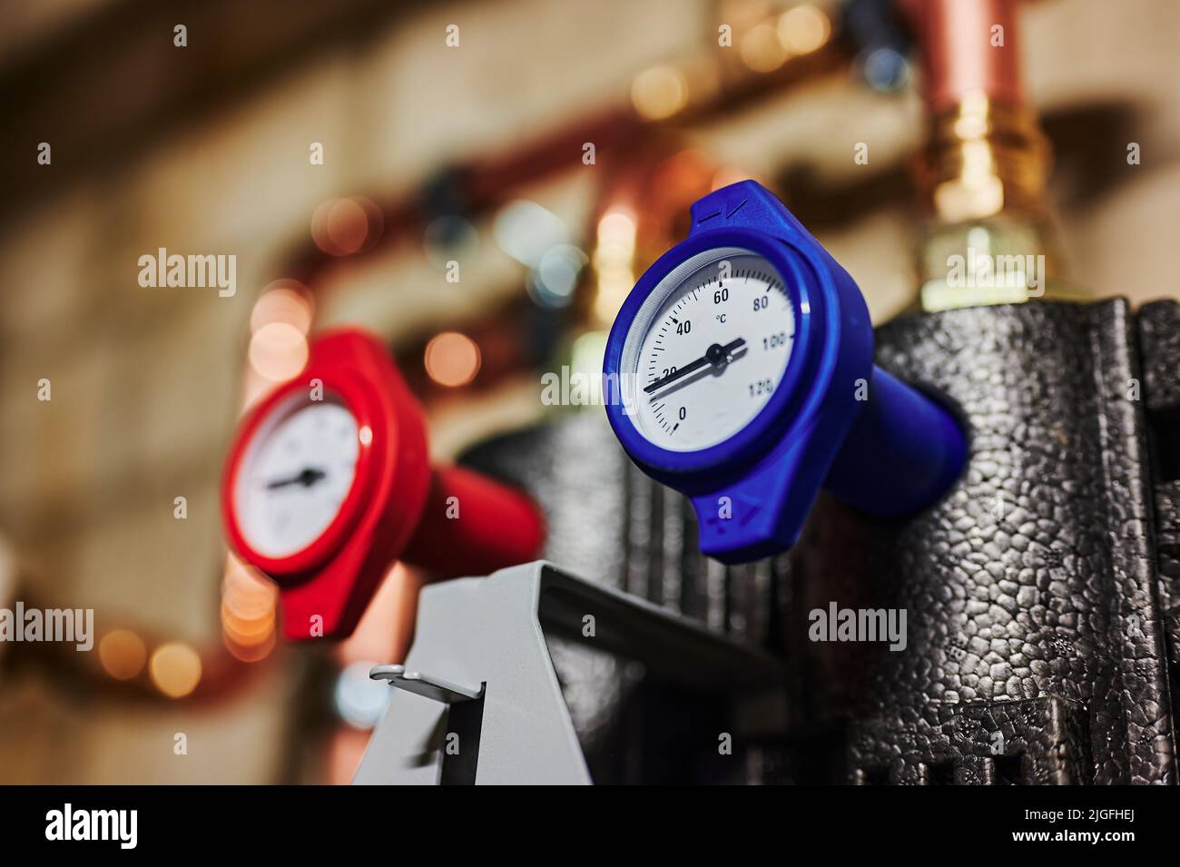 Heating system under construction with a view to the thermometers of ...
