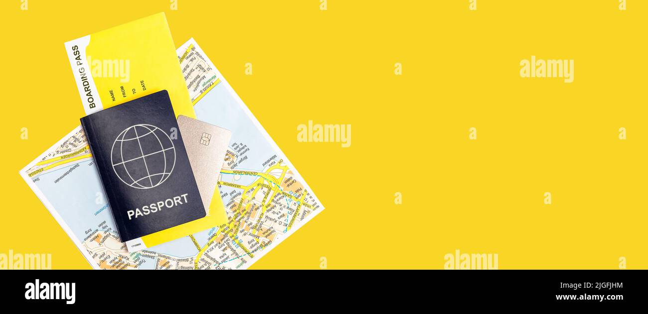 Banner with passport, boarding pass, credit card and tourist map on ...