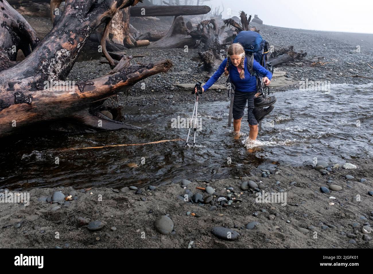 WA20549-00....WASHINGTON - Vicky Spring crossing Ellen Creek along ...