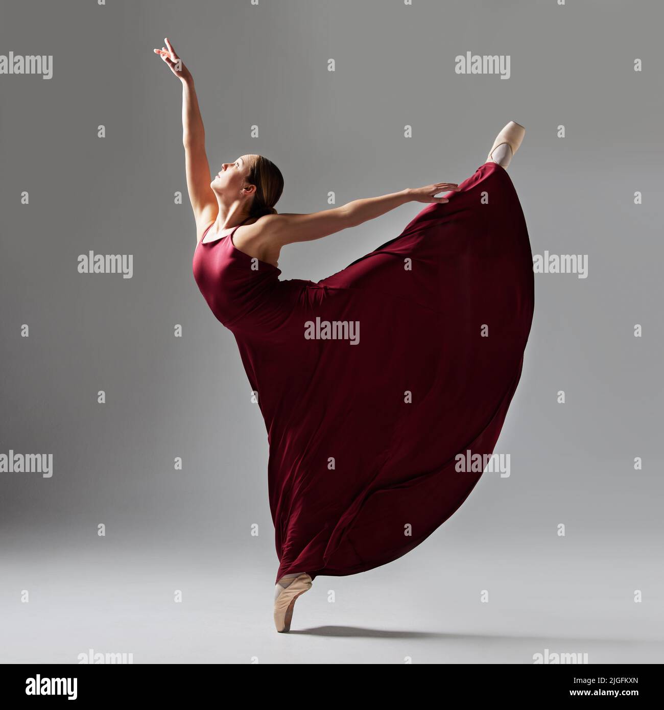 Live to dance. Full of a beautiful young ballet dancer rehearsing in a ...