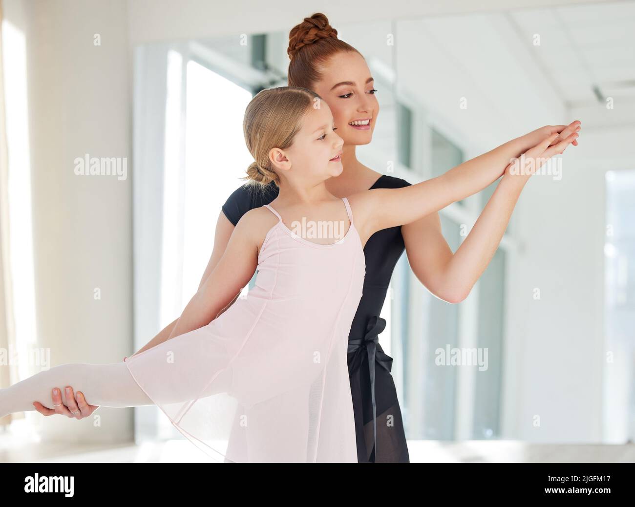Dance design is not simply one element. a little girl practicing ballet ...