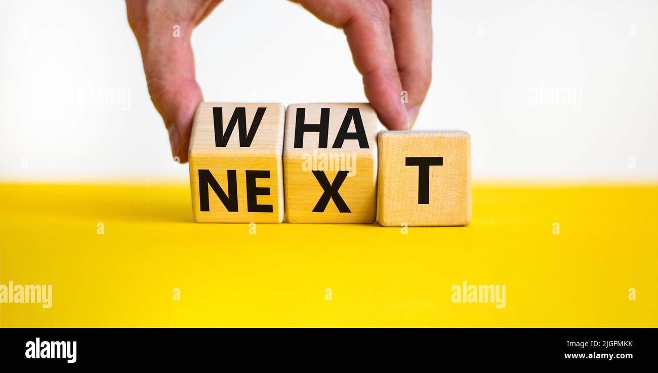 What next symbol. Concept words What next on wooden blocks. Businessman ...