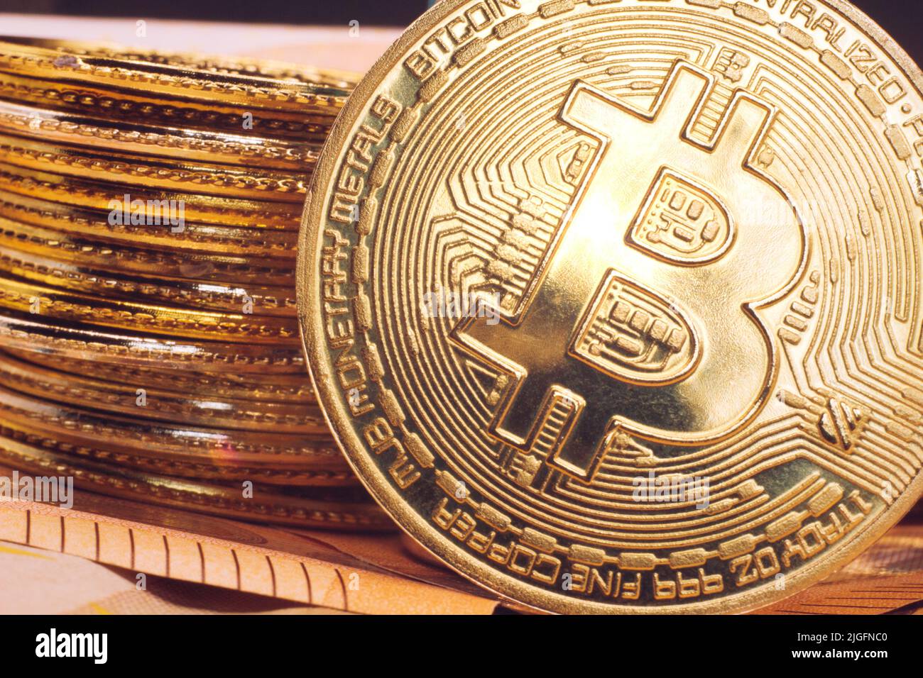 Macro view of a stack of golden bitcoins Stock Photo - Alamy