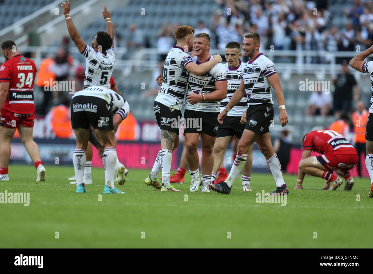 A happy Hull FC celebrate after the final whistle Stock Photo - Alamy