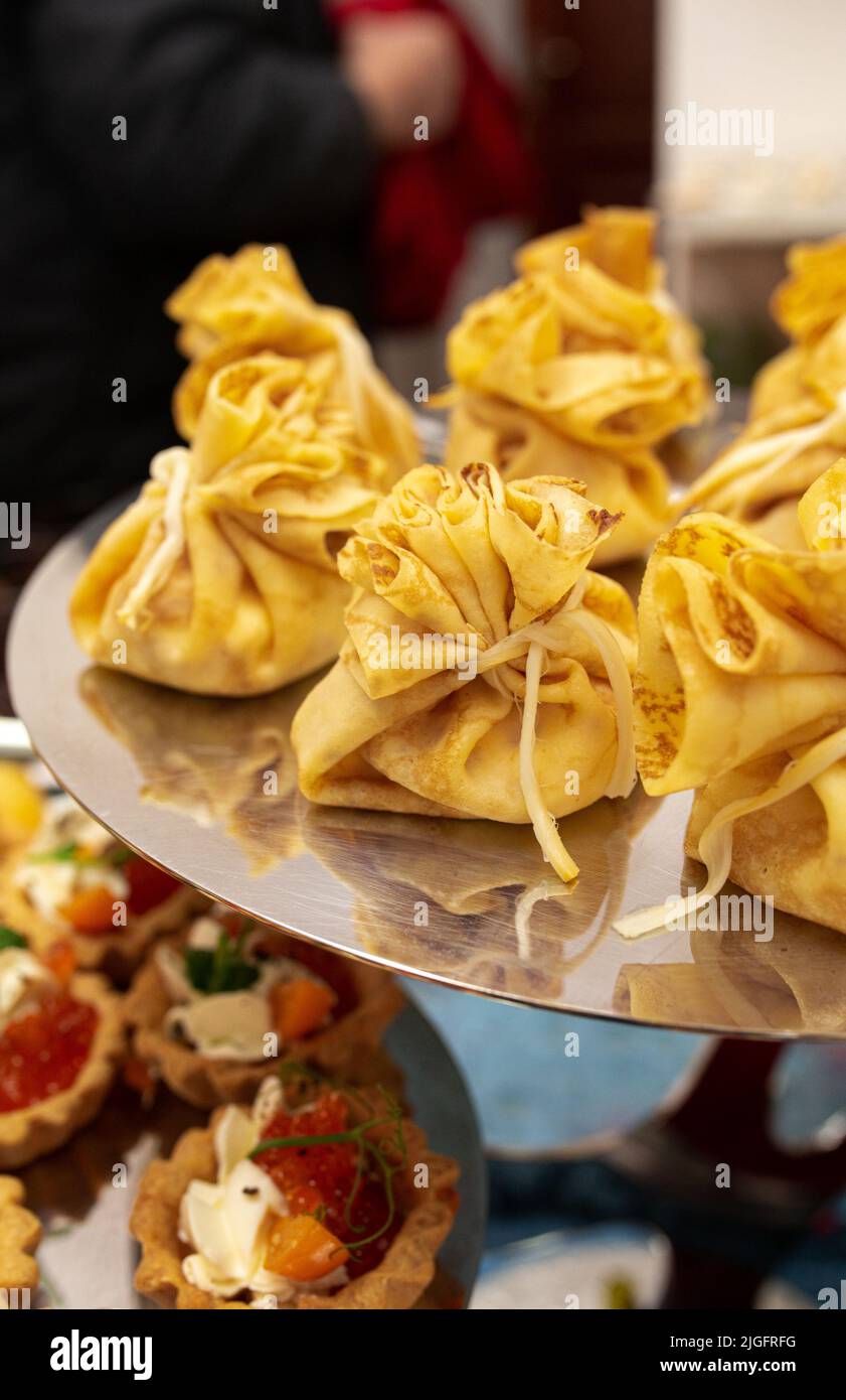 pancake bag with filling snack at the buffet Stock Photo - Alamy