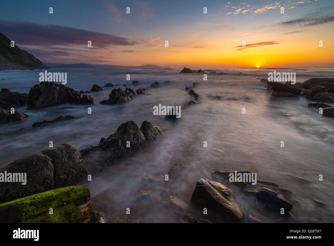 Beach of Barrika at sunset, Basque Country, Spain Stock Photo - Alamy