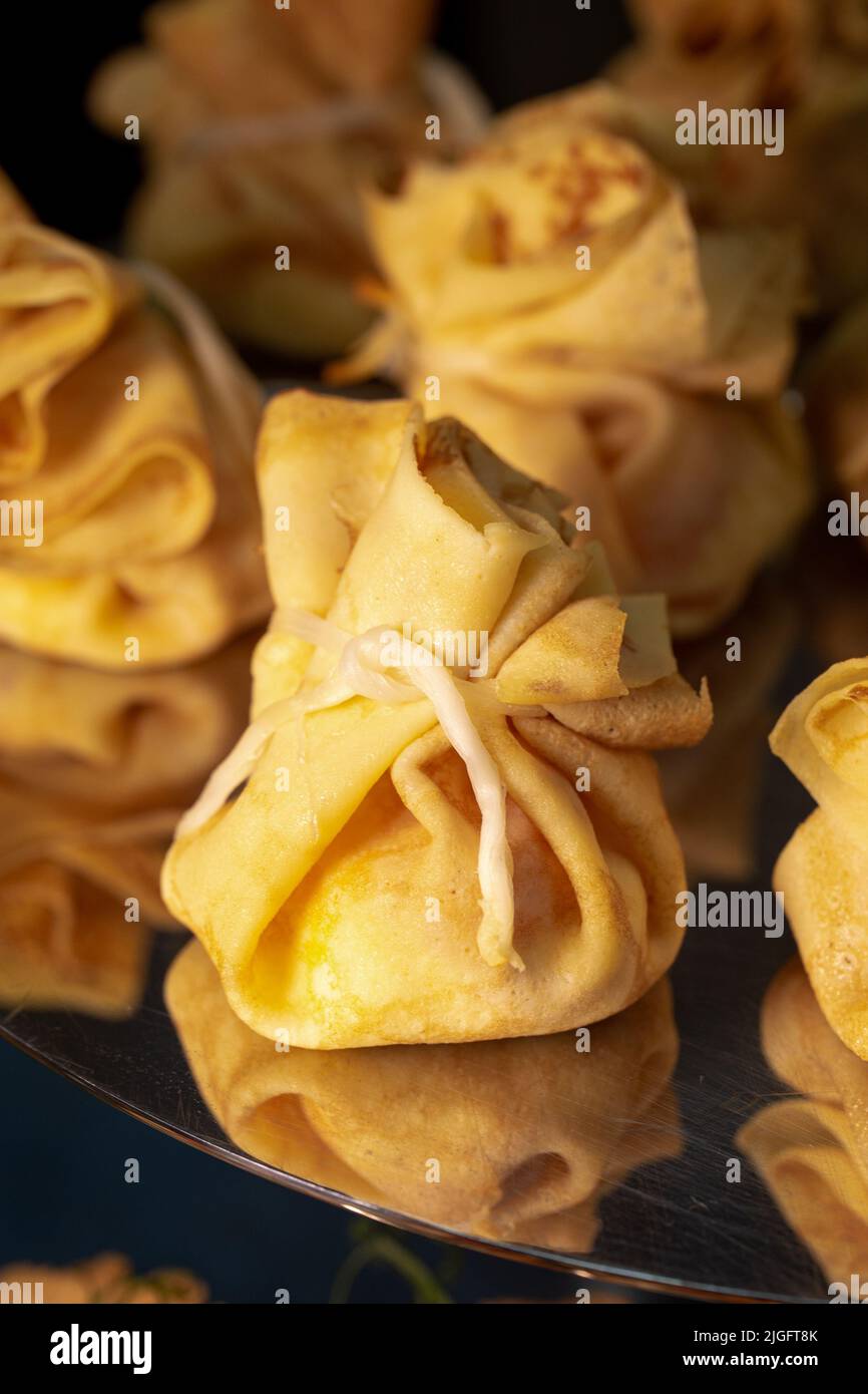 pancake bag with filling snack at the buffet Stock Photo - Alamy