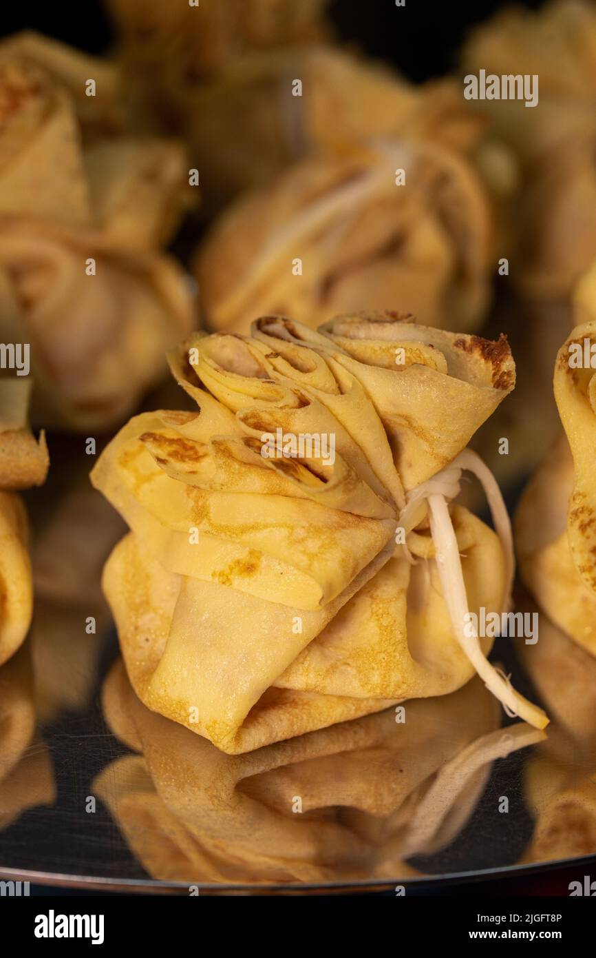 pancake bag with filling snack at the buffet Stock Photo - Alamy