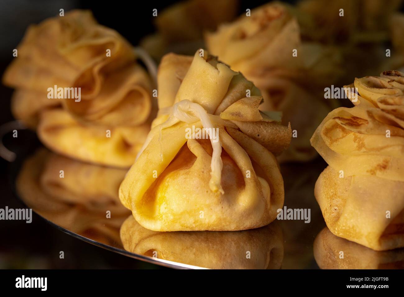 pancake bag with filling snack at the buffet Stock Photo - Alamy