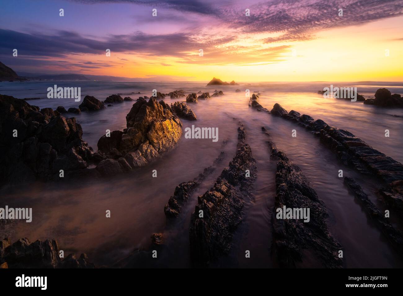 Beach of Barrika at sunset, Basque Country, Spain Stock Photo - Alamy