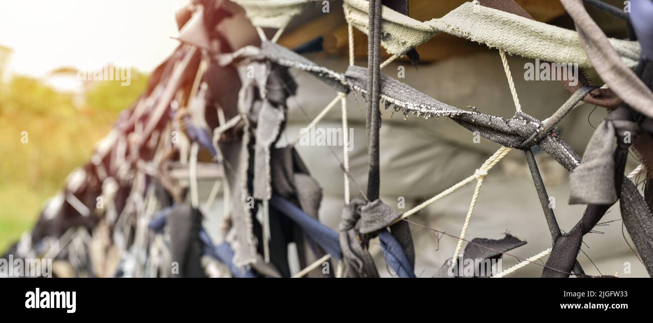 Homemade camouflage net made by people for the military. Masking the ...