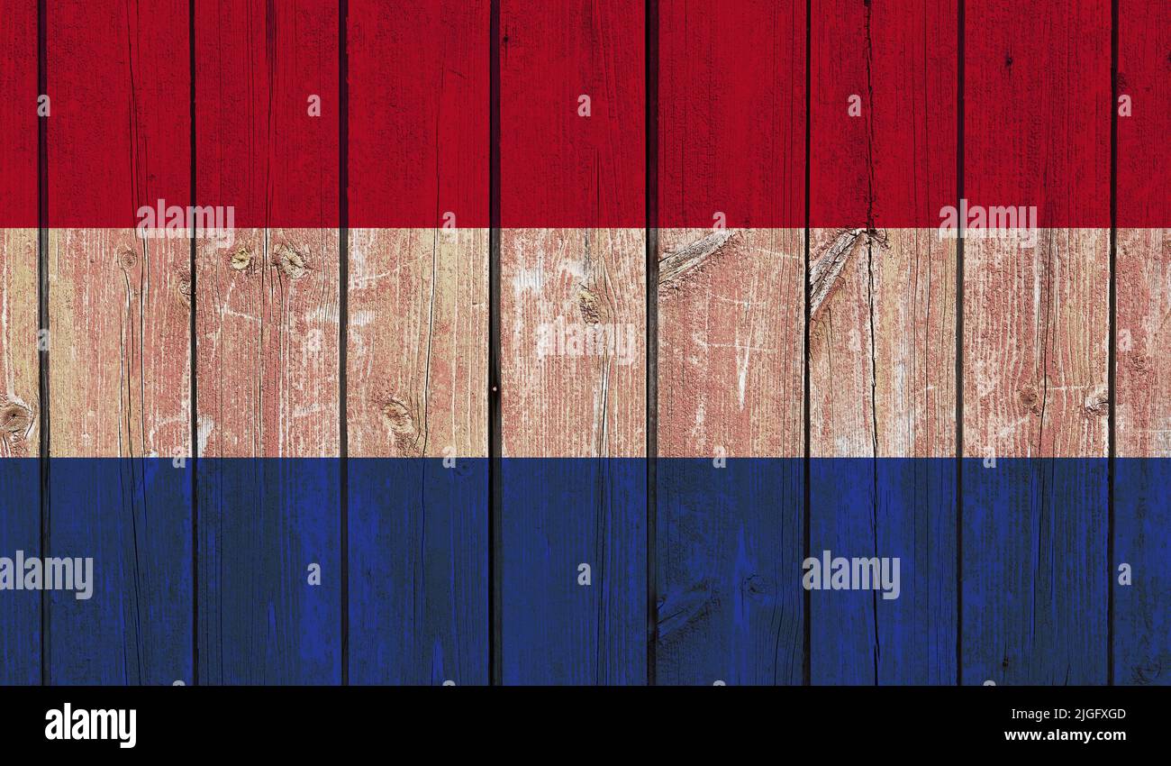 Top view of Old Painted Flag of Netherlands on Dark Wooden Fence, wall ...