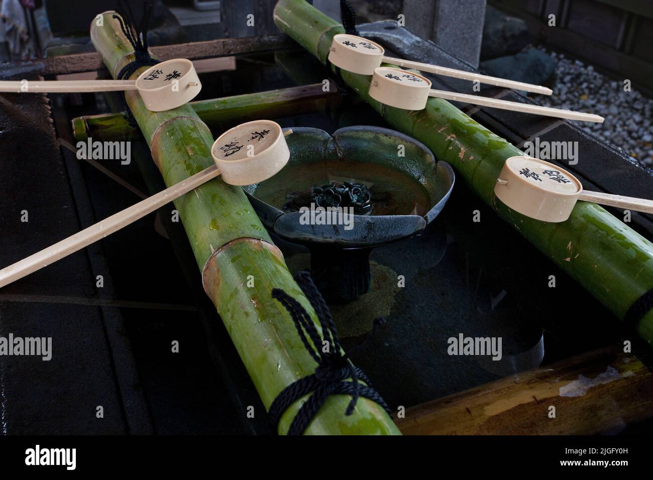 Dippers water basin Yushima Shrine Tokyo Japan Stock Photo - Alamy