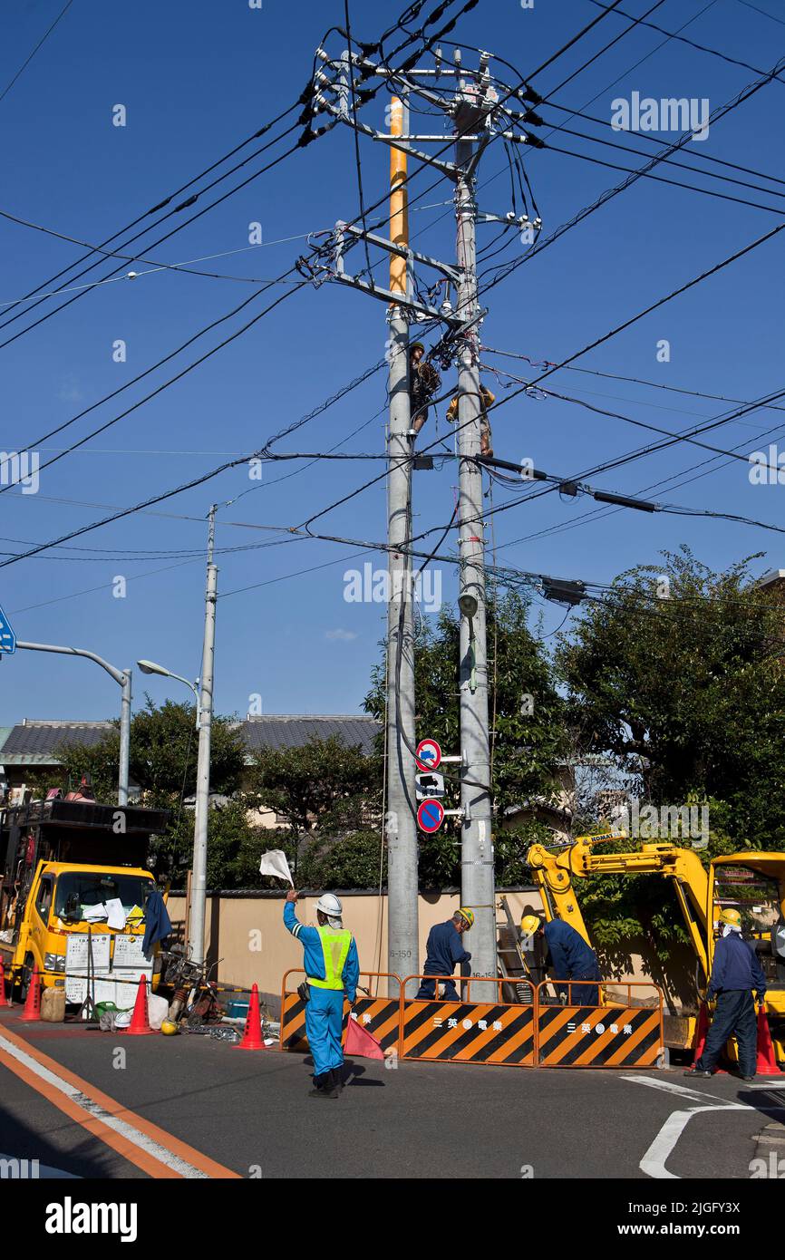 Electric power repair crew Naka Ikegami Tokyo Japan Stock Photo - Alamy