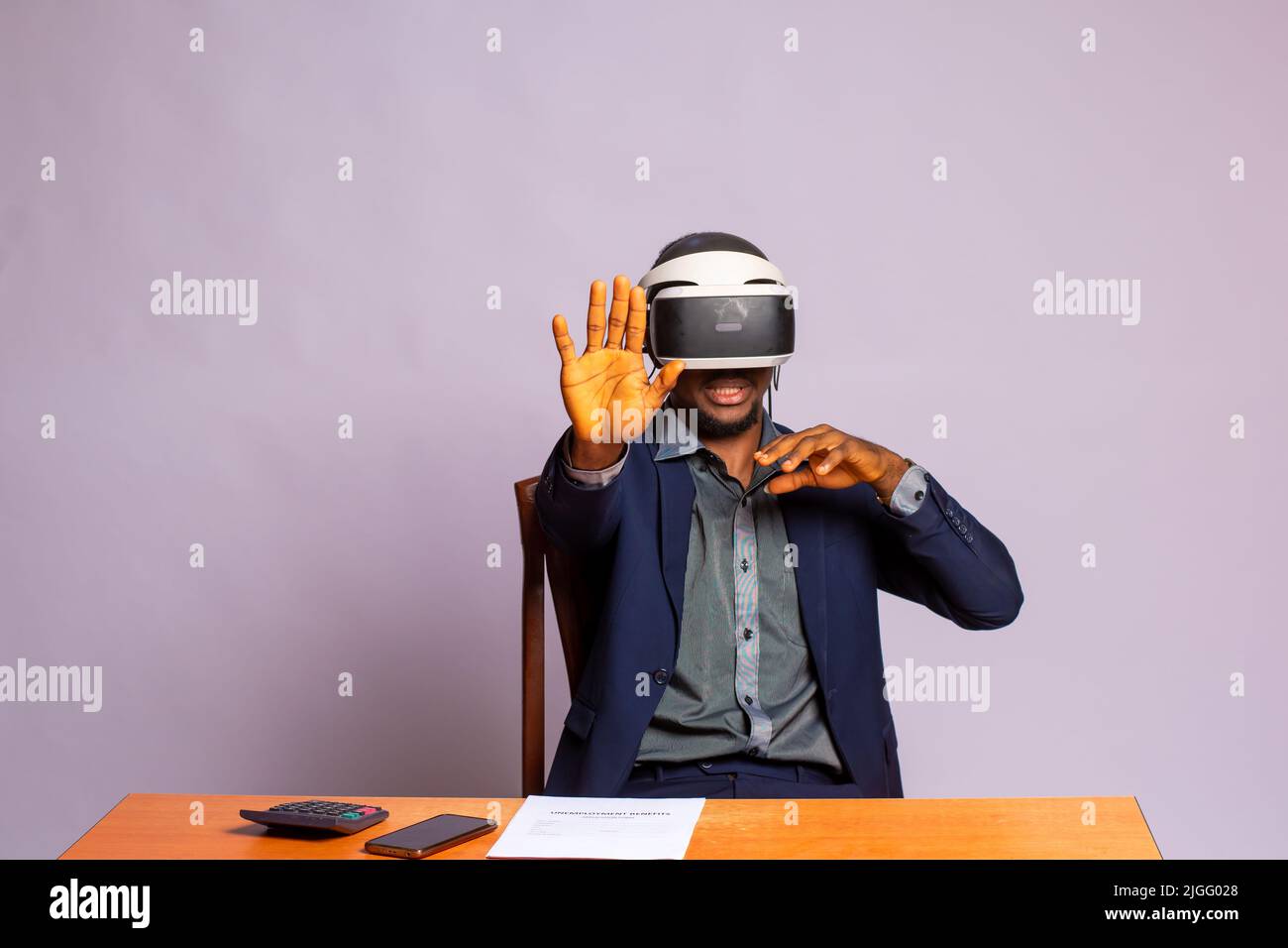man using vr pointing isolated over white background Stock Photo - Alamy