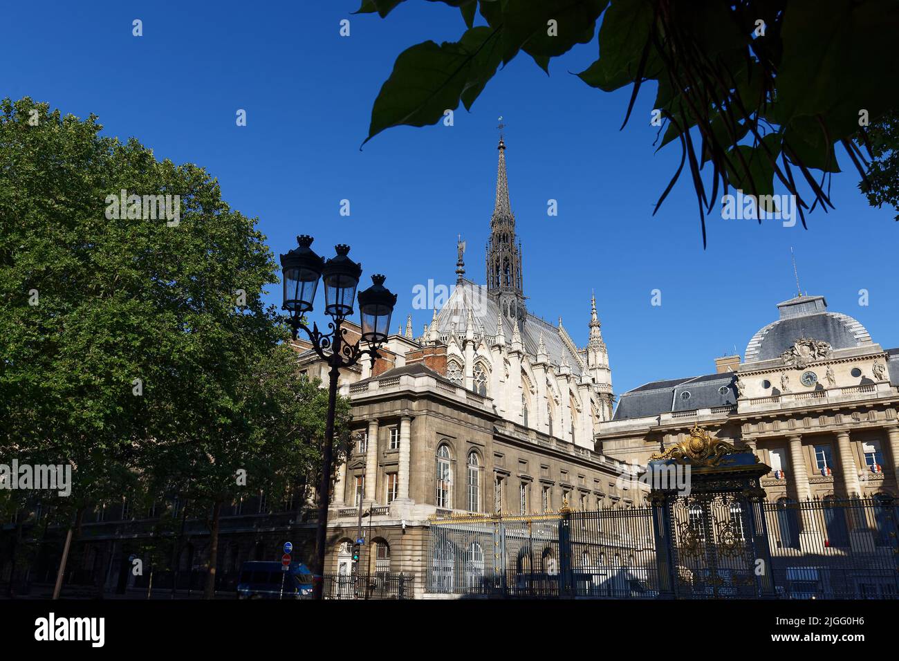 Spire of Saint-Chapelle -Holy Chapel with street lamp in foreground ...