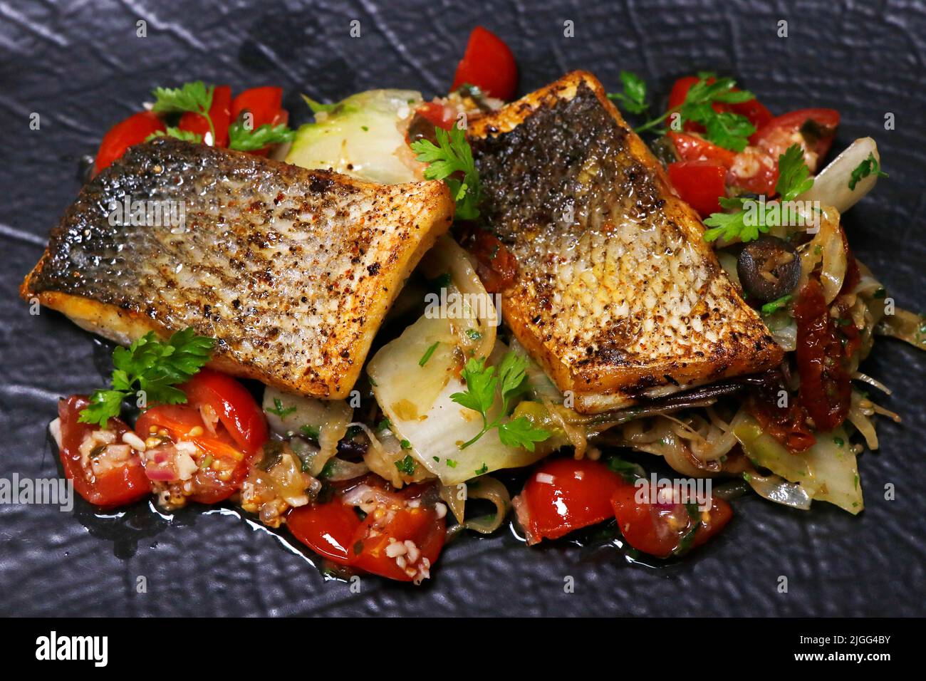 pan seared white fish fillet, mediterranean style cooking Stock Photo ...