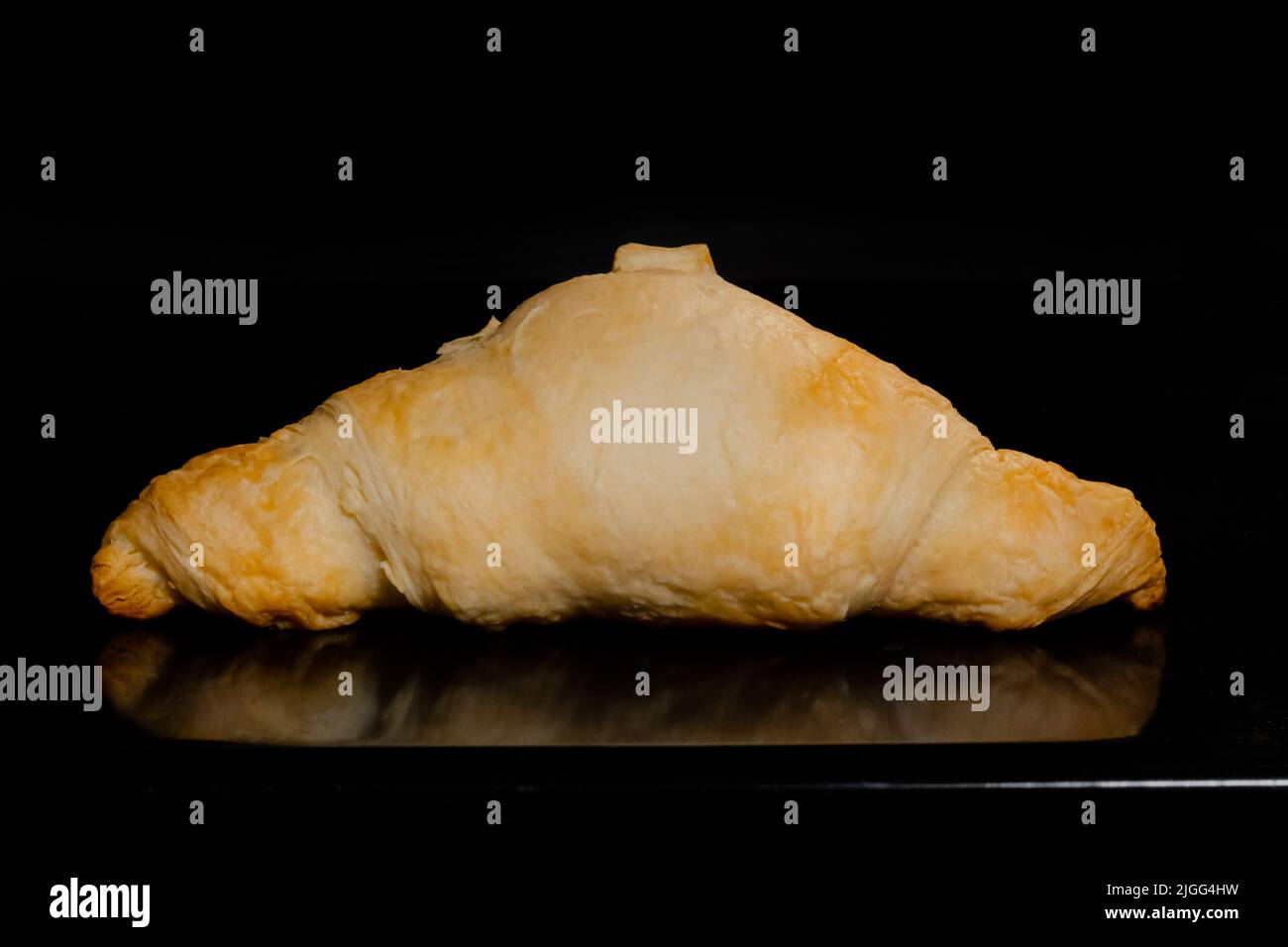 Homemade croissant baking and rising in electric oven Stock Photo - Alamy