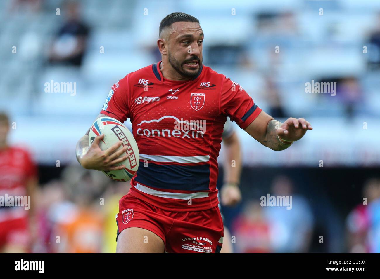 Elliot Minchella #17 of Hull KR runs with the ball up the pitch in, on ...