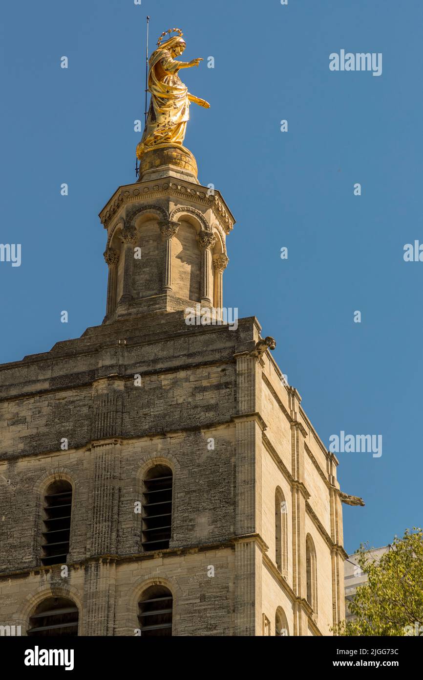 Golden Madonna figure on the papal palace in Avignon, France Stock ...