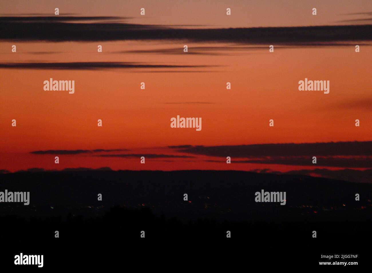 The sky at sunset and last-light silhouettes Stock Photo - Alamy