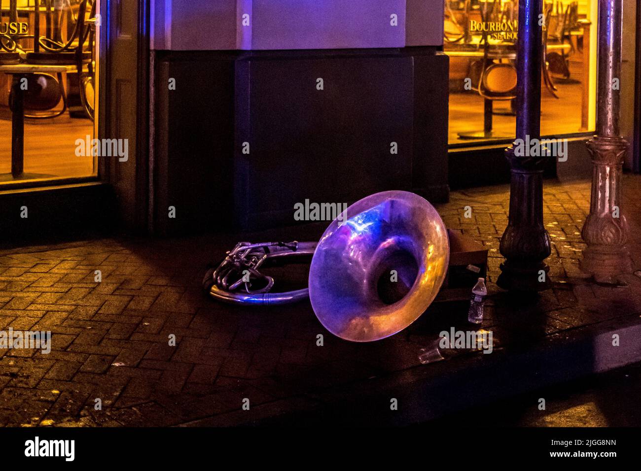 Bourboun Street of New Orleans (Louisiana) at night, showing a trombone ...