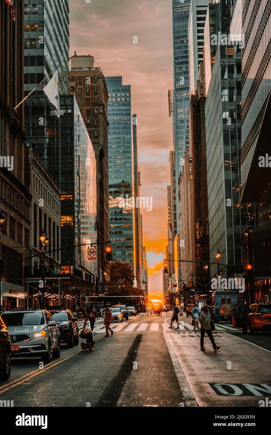 Sunset on Manhattan streets (Manhattanhenge) in New York Stock Photo ...
