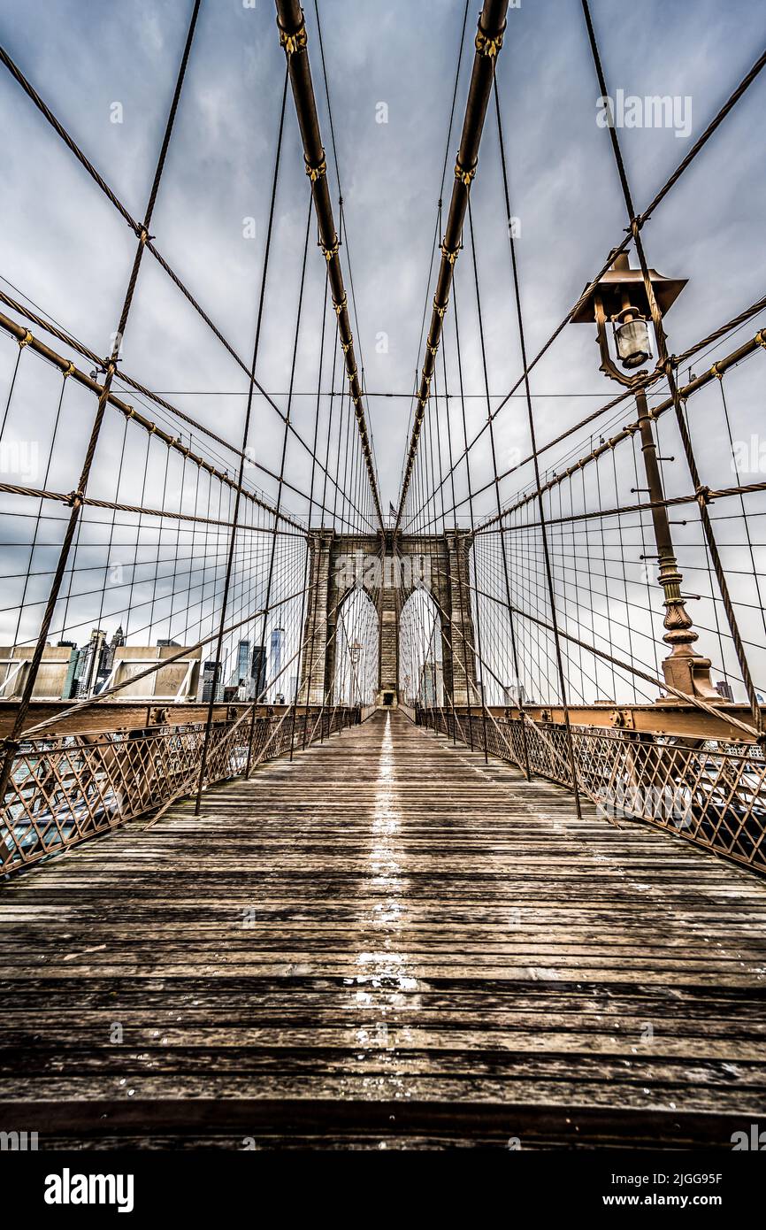 Brooklyn Bridge, New York, USA. Perspective view of the bridge with the ...