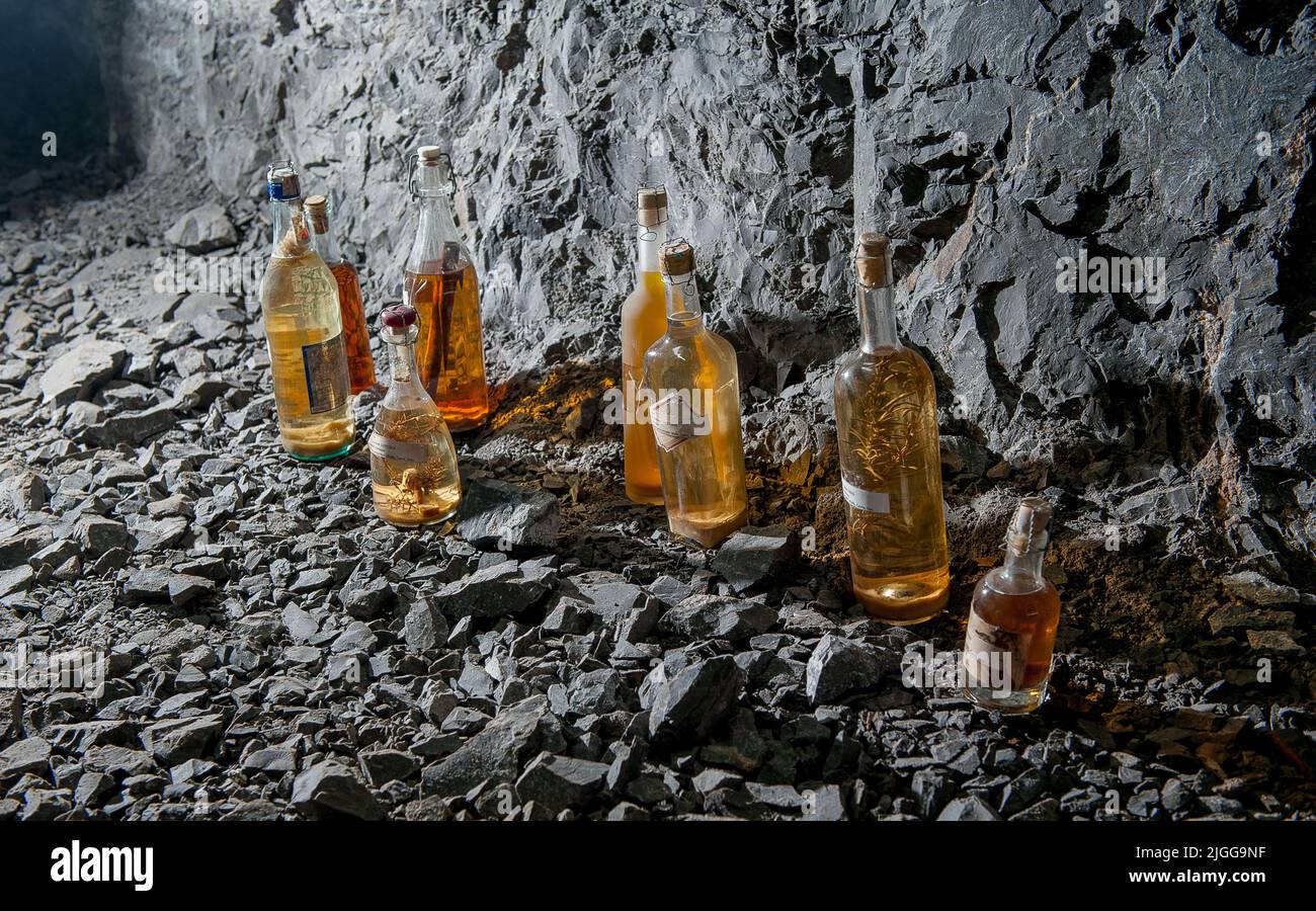 Liquor bottles in mining tunnel Stock Photo - Alamy