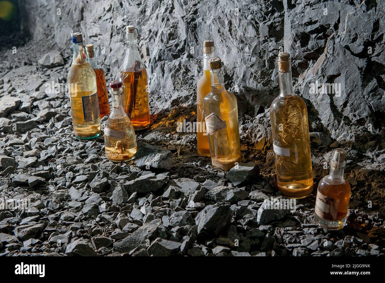 Liquor bottles in mining tunnel Stock Photo - Alamy
